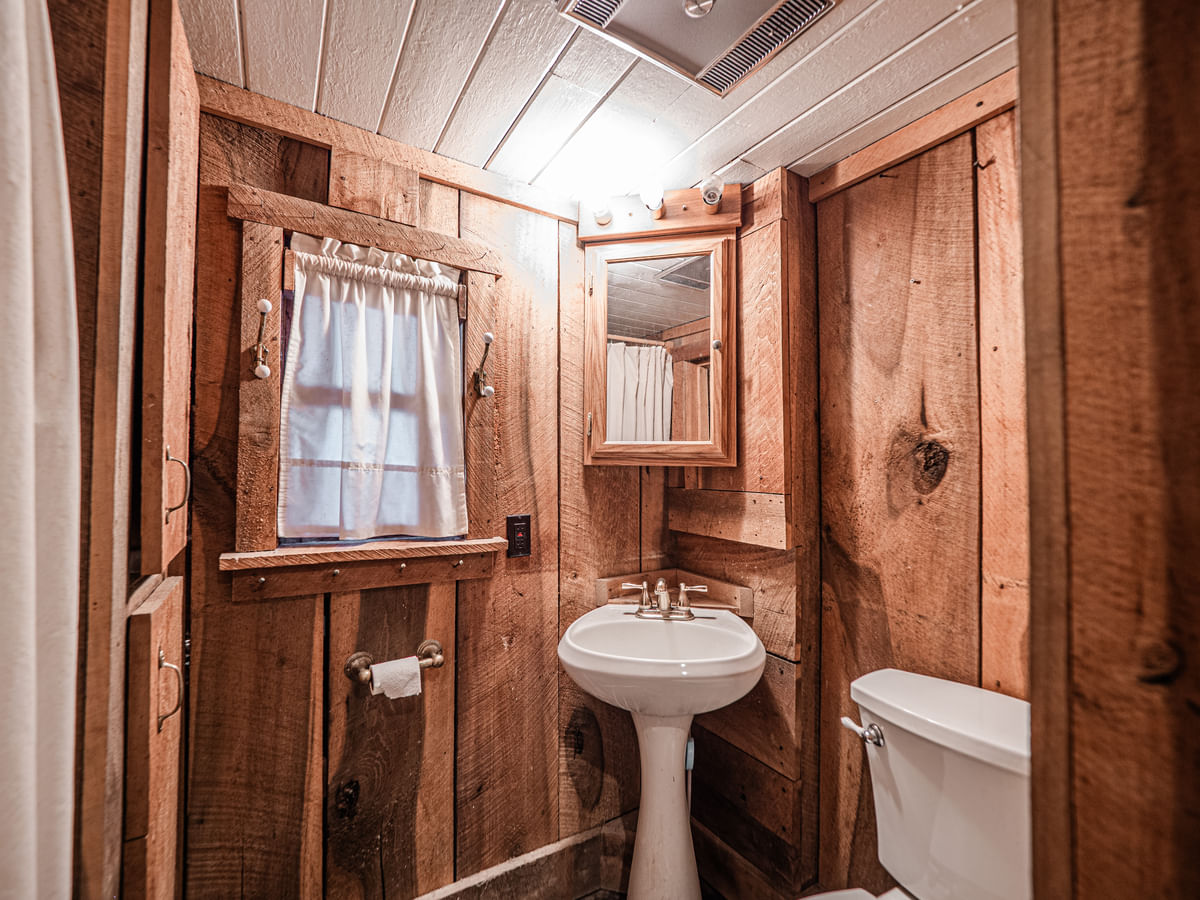 Wilson Auctions | UNIQUE LOG CABIN HOME ON .23 AC LOT